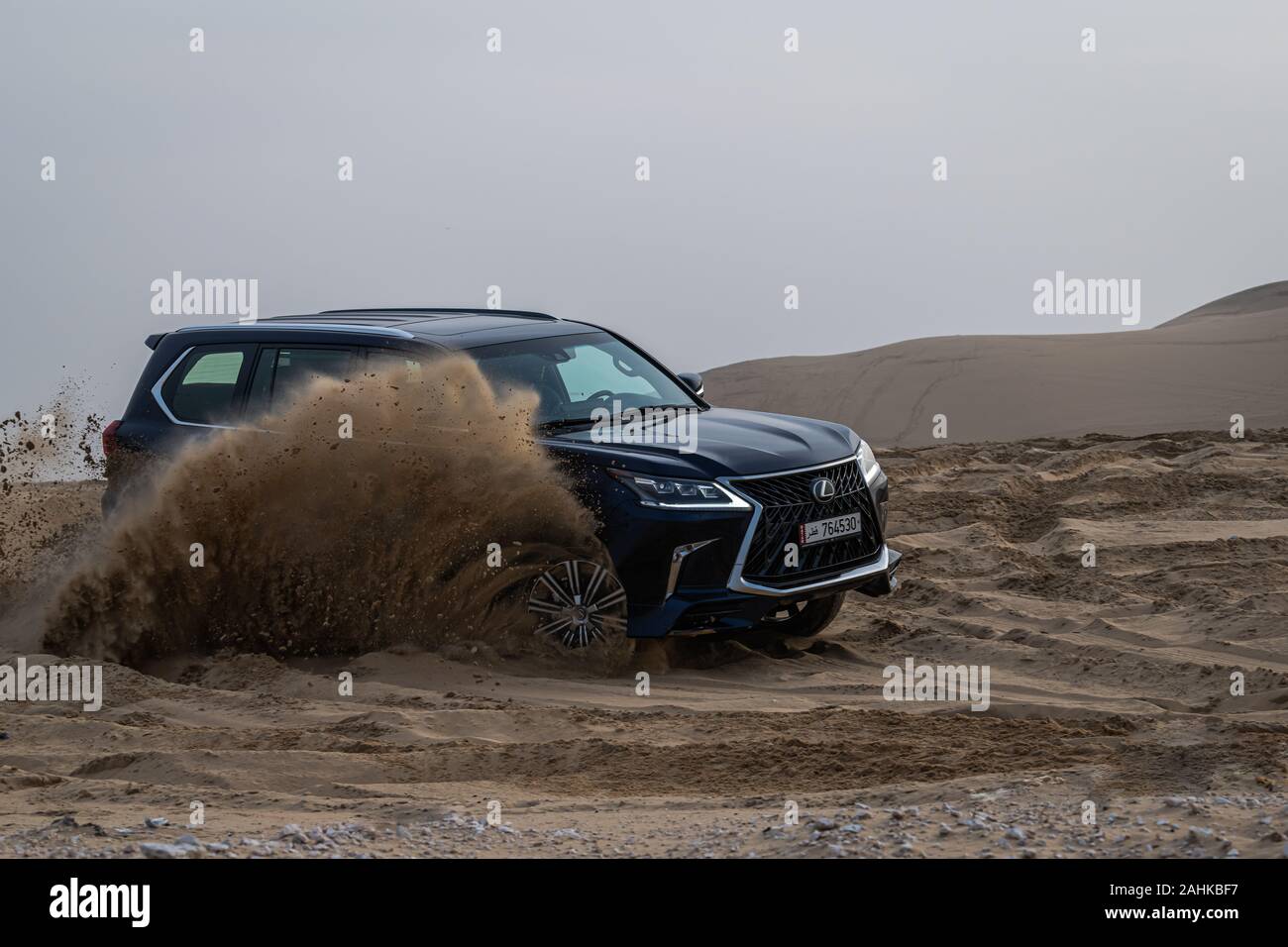 Blue Lexus LX 570 Dune Bashing at Desert Stock Photo - Alamy
