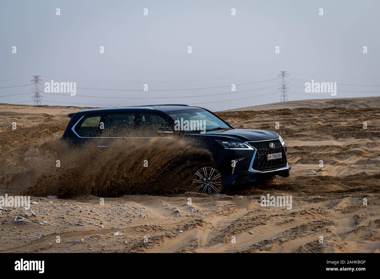 Blue Lexus LX 570 Dune Bashing at Desert Stock Photo - Alamy