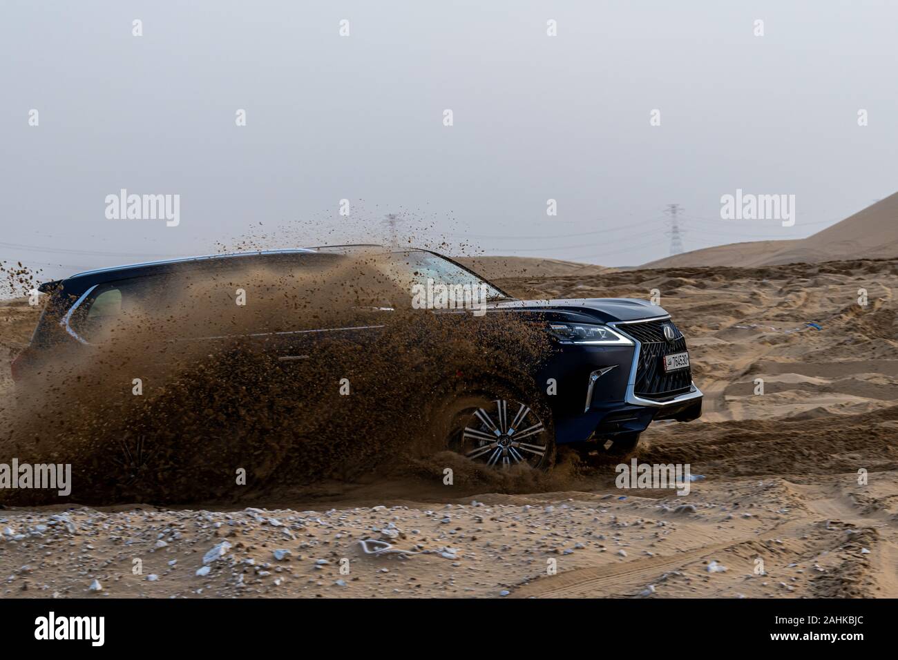 Blue Lexus LX 570 Dune Bashing at Desert Stock Photo - Alamy