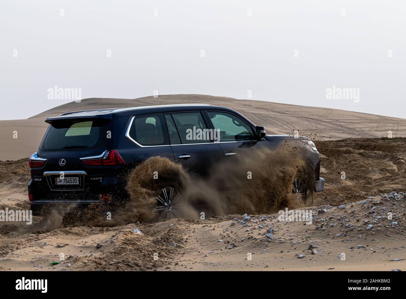 Blue Lexus LX 570 Dune Bashing at Desert Stock Photo - Alamy