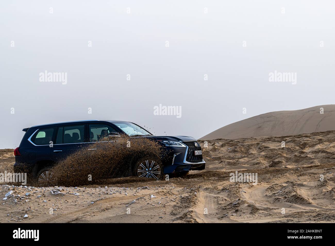 Blue Lexus LX 570 Dune Bashing at Desert Stock Photo - Alamy