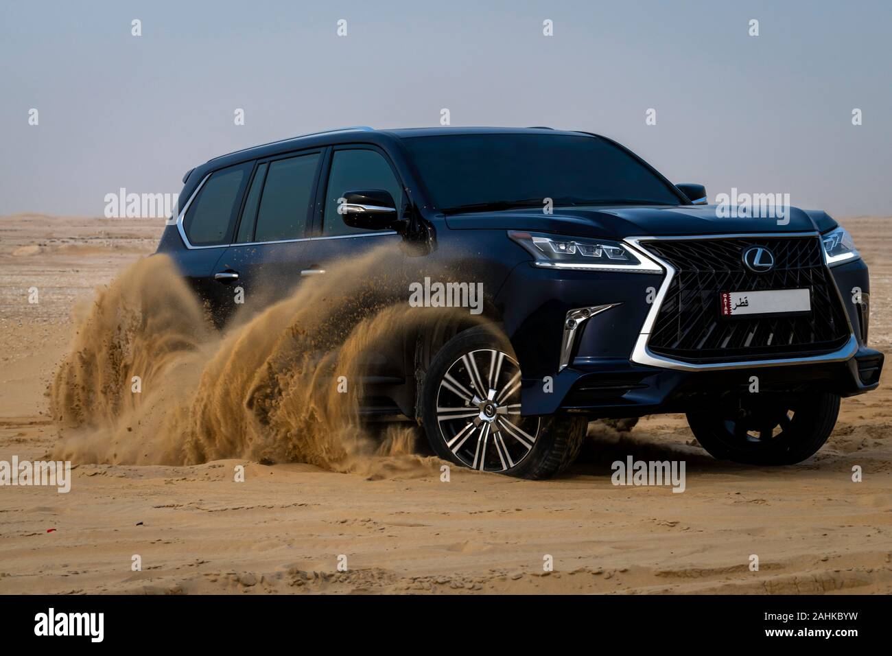 Blue Lexus LX 570 Dune Bashing at Desert Stock Photo - Alamy