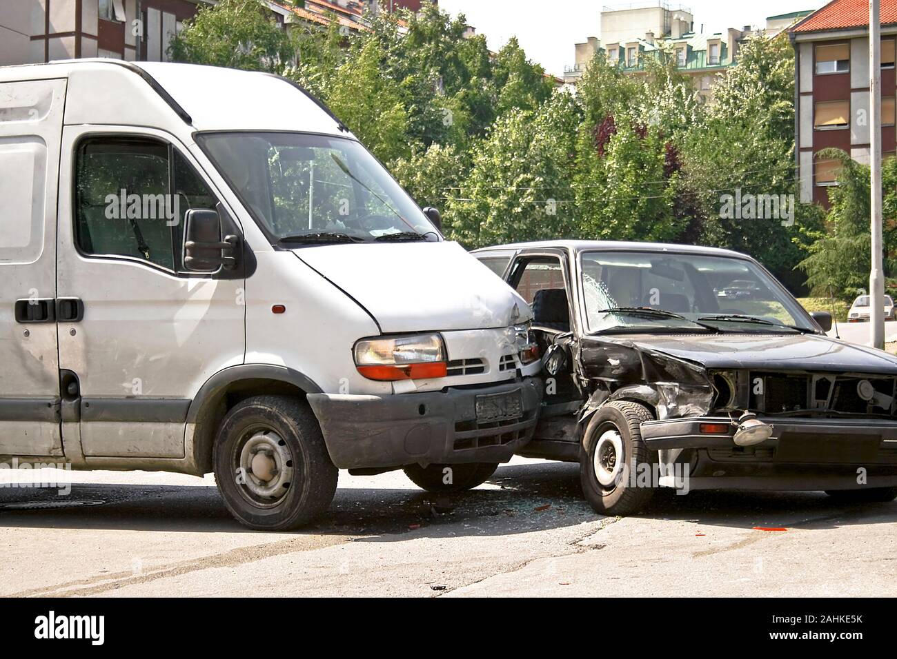 Traffic accident of mini van and car Stock Photo - Alamy