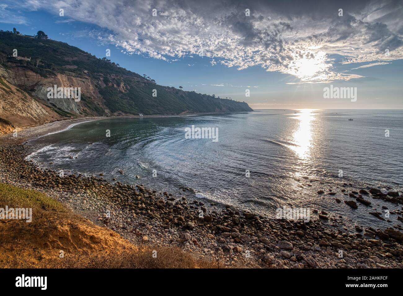 Beautiful coastal seascape of rugged Bluff Cove with dramatic clouds in ...