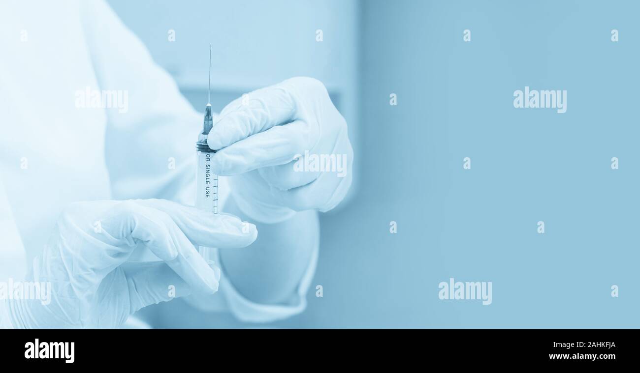 Medical healthcare. Doctor with syringe, injection in hospital Stock ...