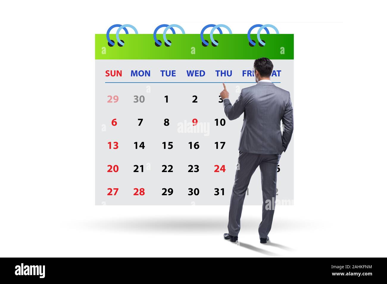 The business calendar concept with businessman Stock Photo - Alamy