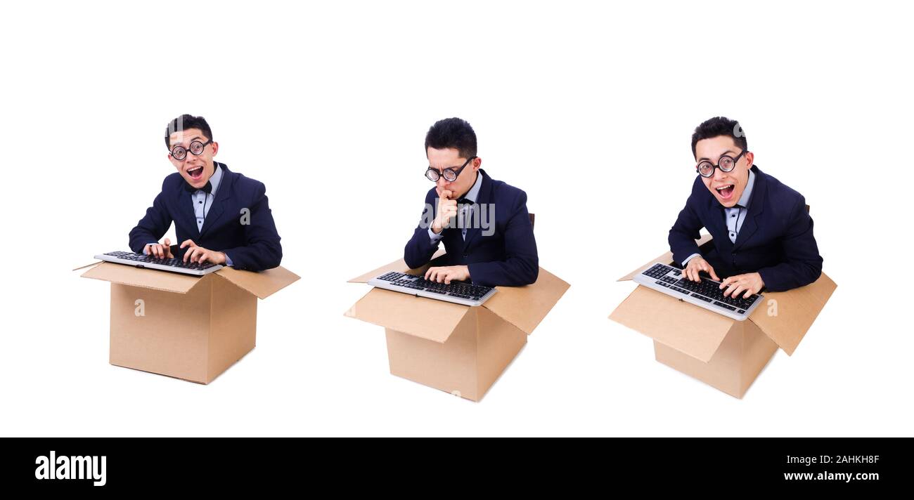 The funny computer geek sitting in the box Stock Photo - Alamy