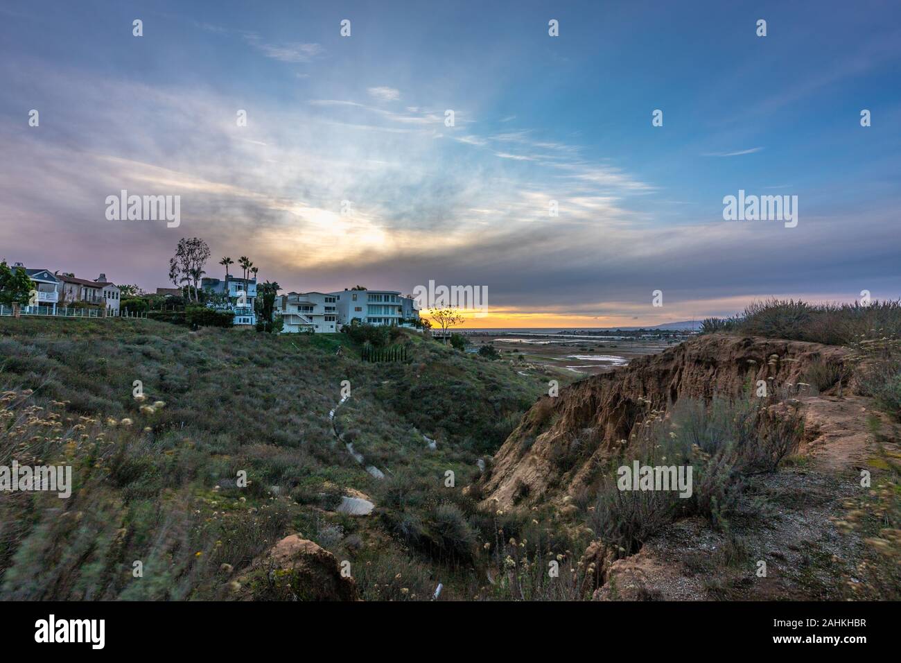 Long exposure bluff top view of Ballona Wetlands at sunset with ...