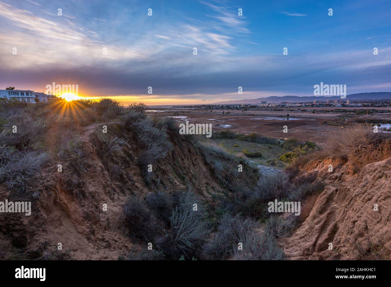 Long exposure bluff top view of Ballona Wetlands at sunset with ...