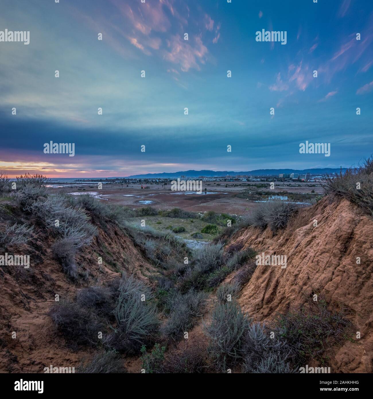 Long exposure bluff top view of Ballona Wetlands at sunset with ...