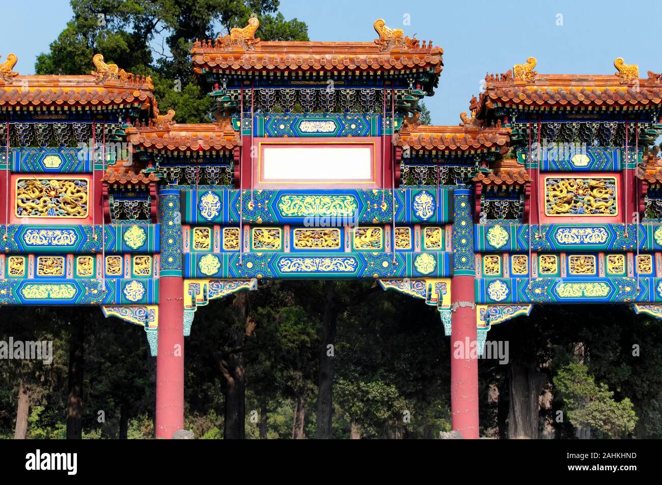 Golden chinese dragon architectural details on a gate within Jingshan ...