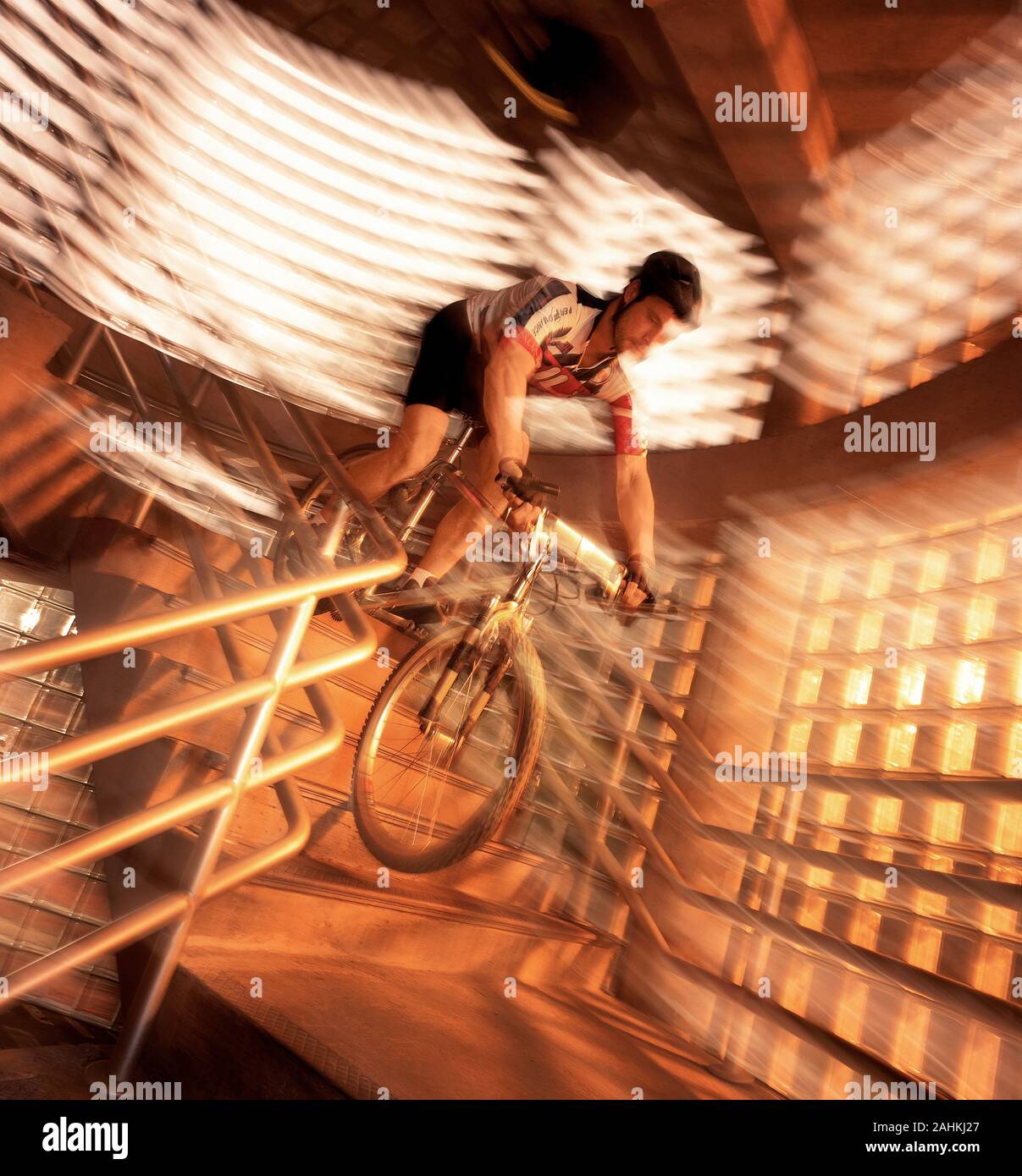 View of a young man riding his cycle down the stairs Stock Photo - Alamy