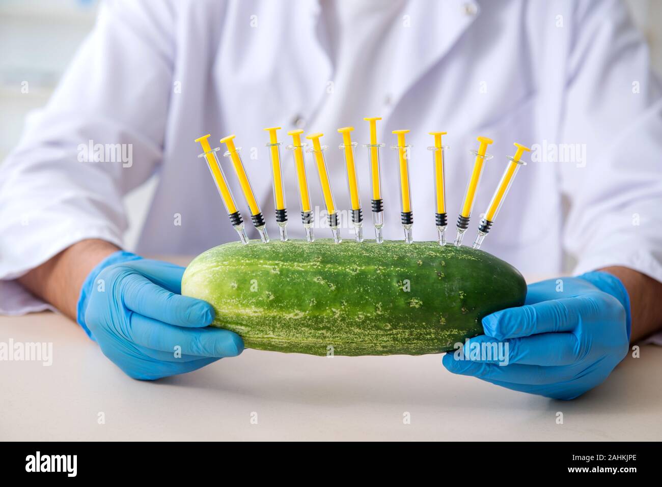 The male nutrition expert testing vegetables in lab Stock Photo - Alamy
