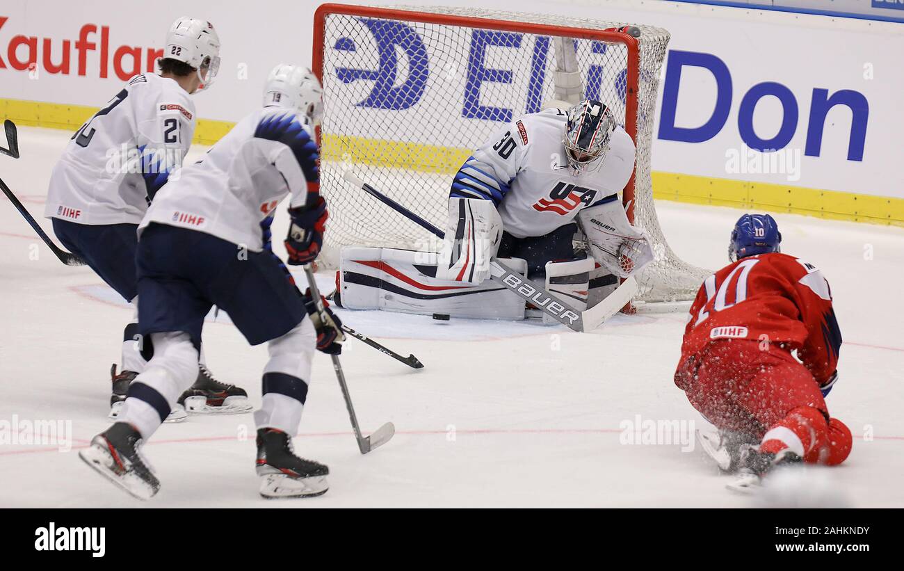 L-R Shane Pinto, K'Andre Miller and goalkeeper Spencer Knight (USA) and Matej Pekar (CZE) in ...