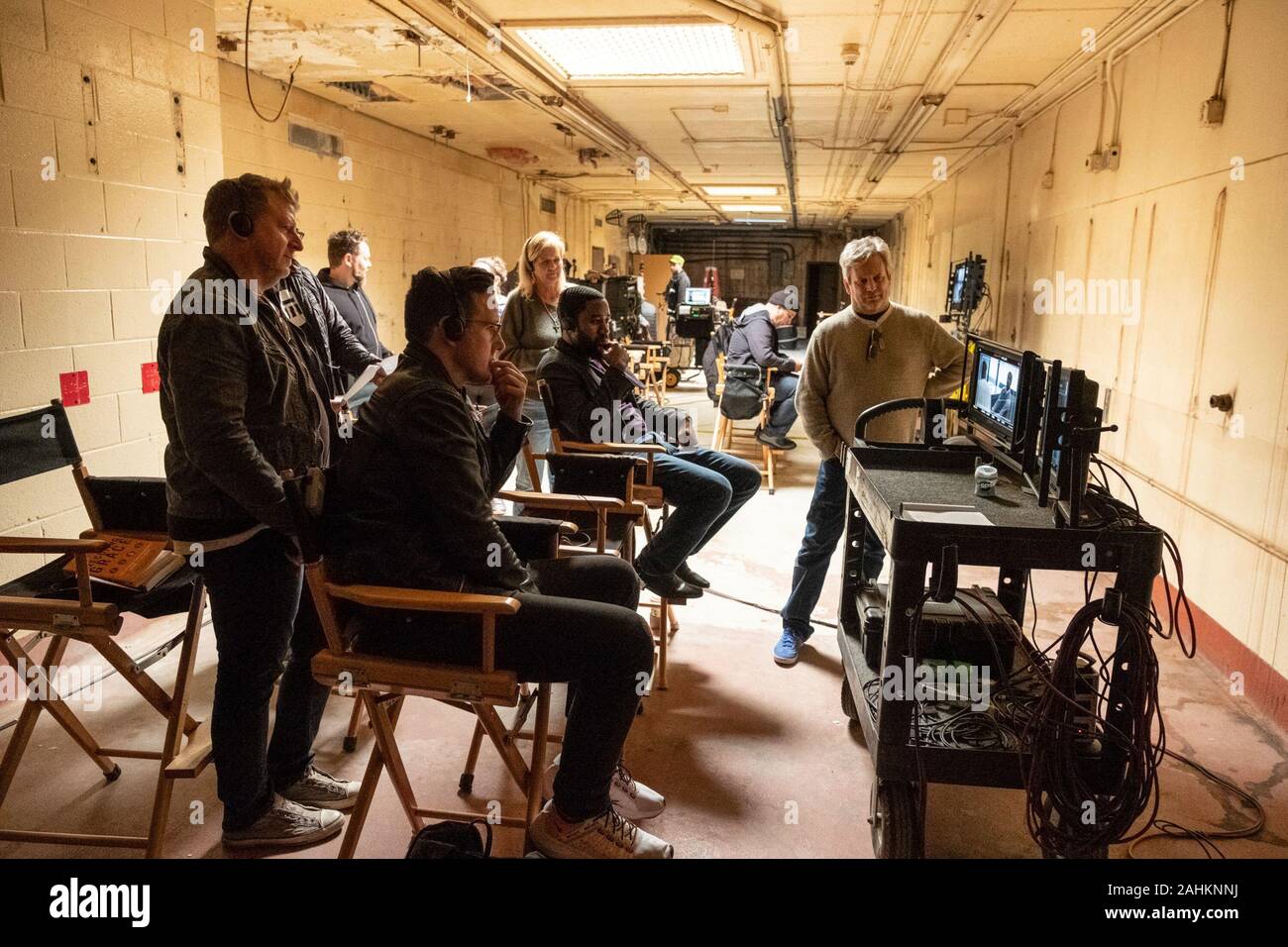 JUST MERCY, seated in foreground: producer Asher Goldstein; standing ...