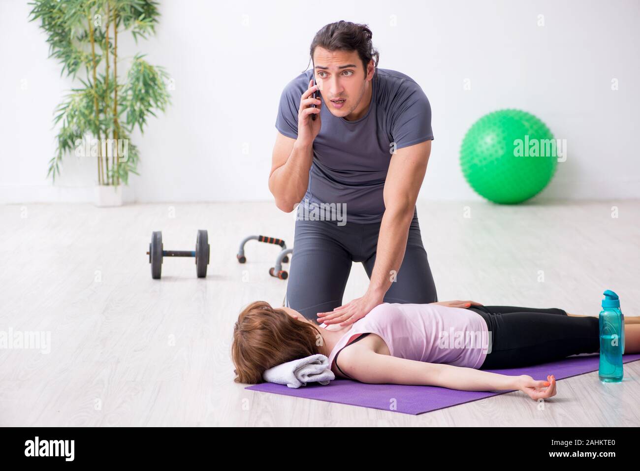 The young woman feeling bad during training in first aid concept Stock ...