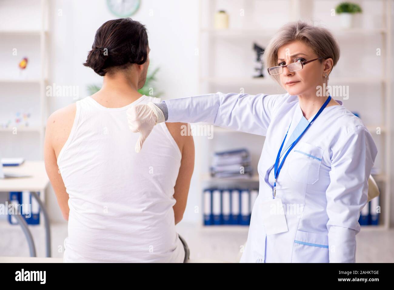 The young patient visiting doctor in hospital Stock Photo - Alamy