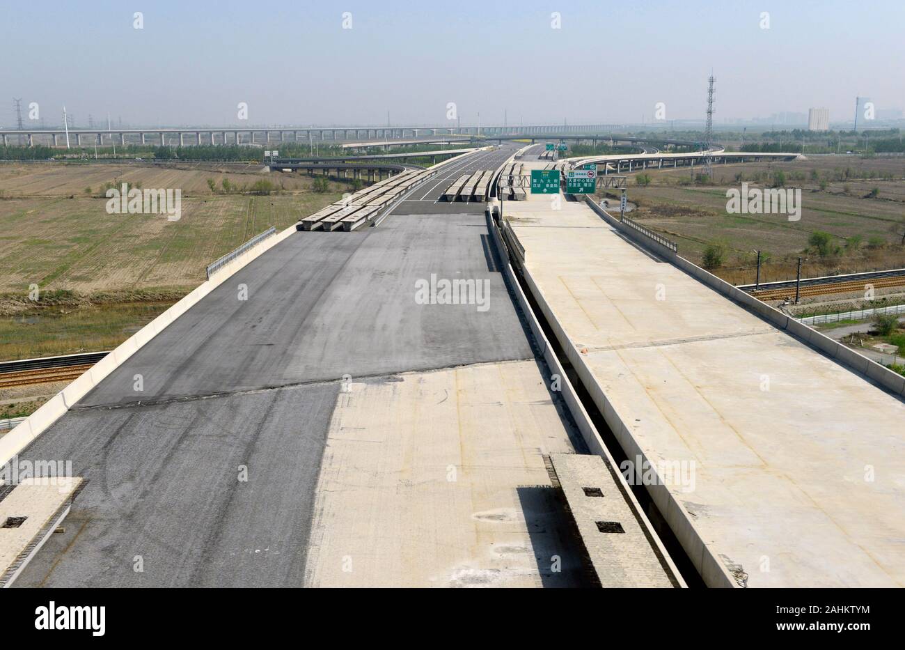 Many-lane highway under construction between Tianjin city area and ...