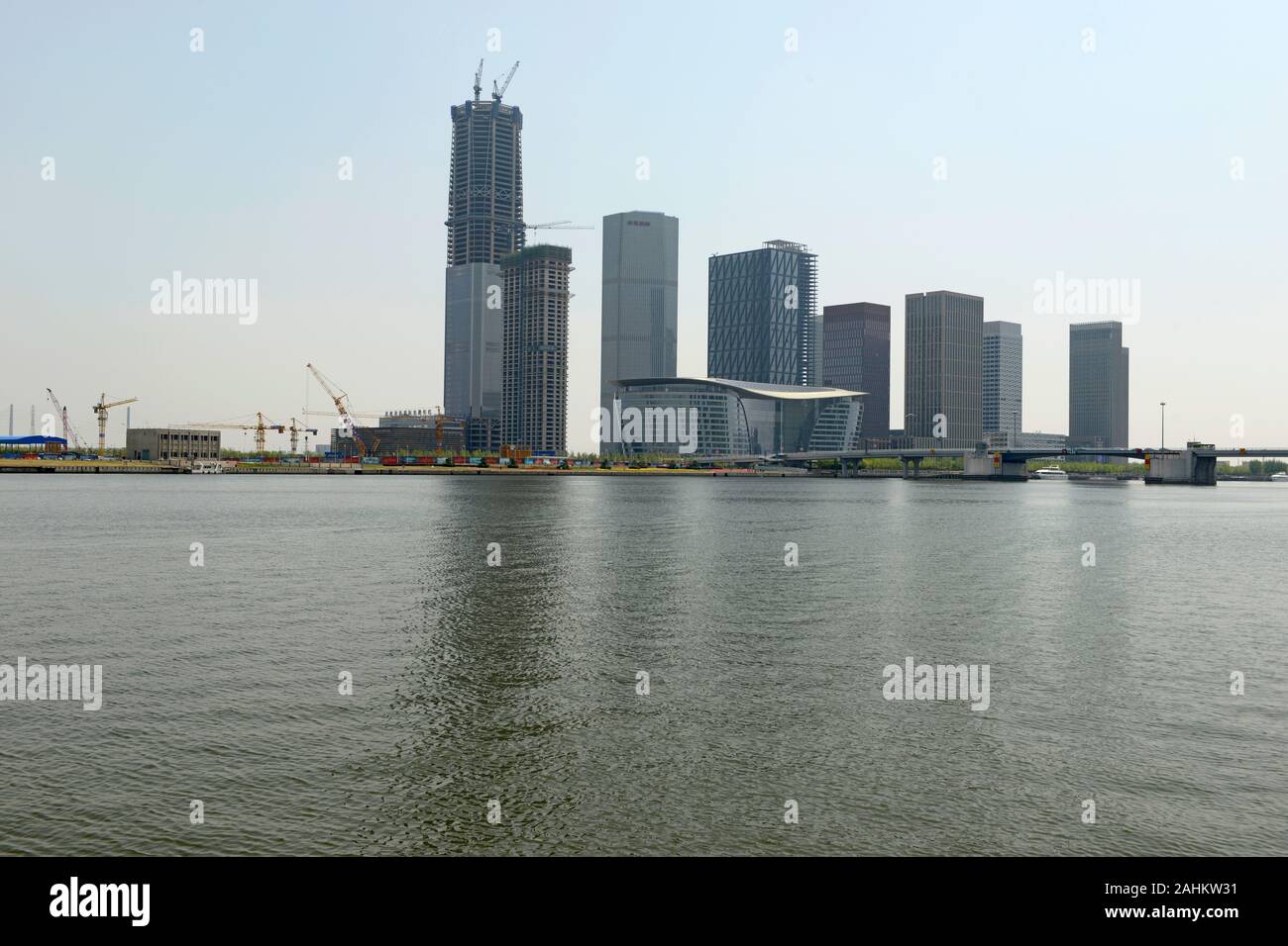 New and under construction high-rise buildings by the Haihe river in ...