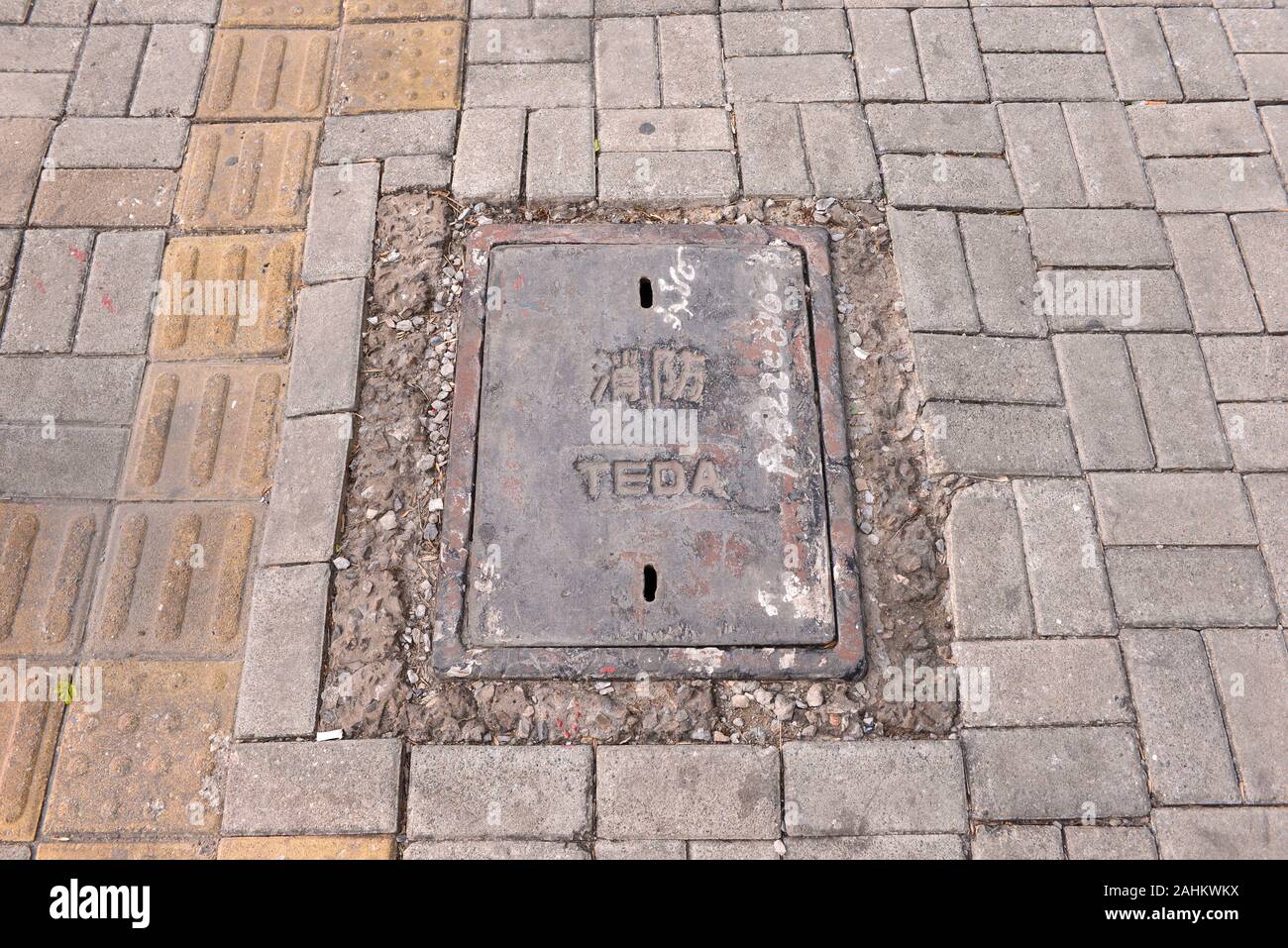 A Tianjin Economic Development Area-branded manhole cover for fire ...