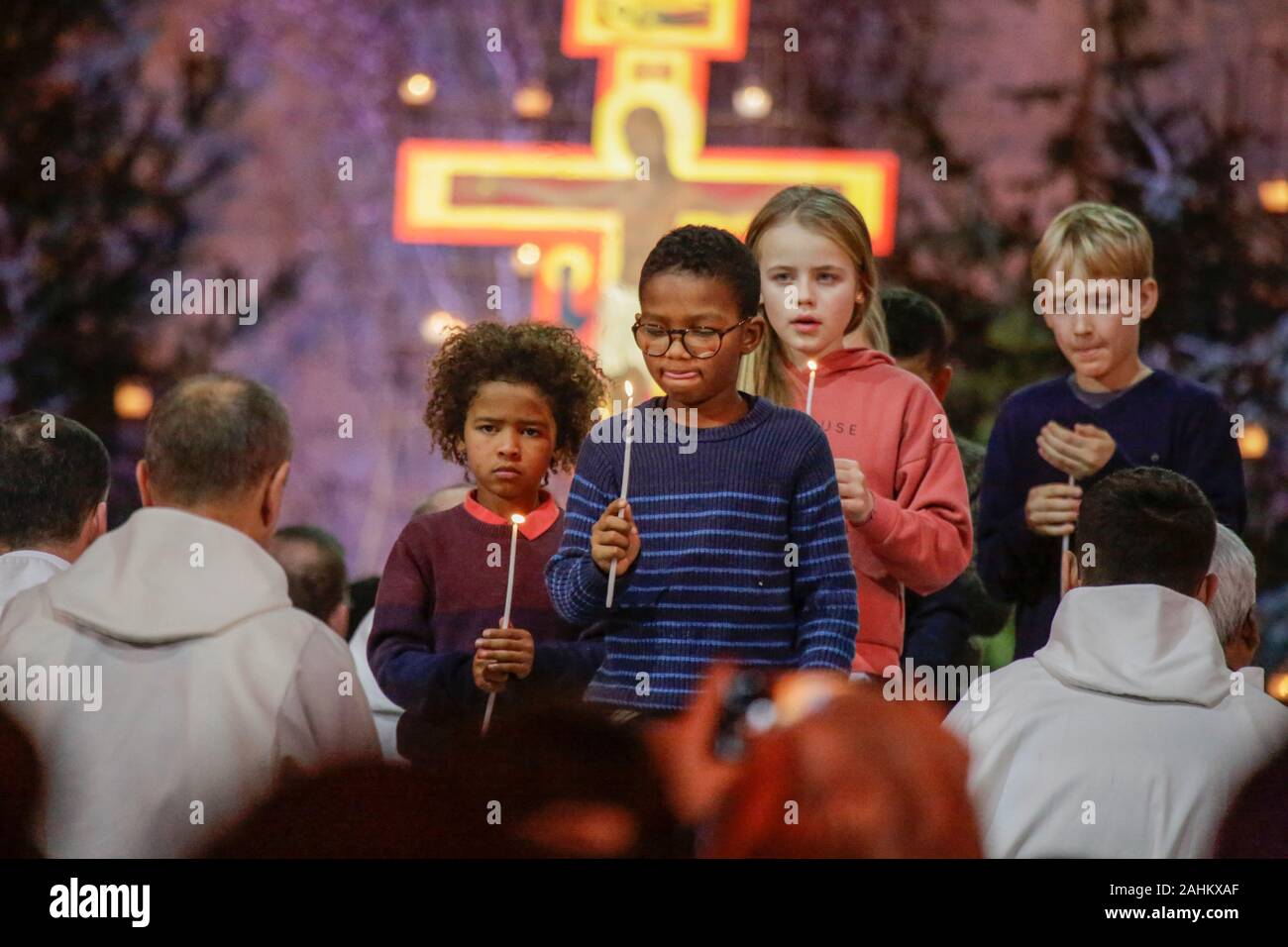 Wroclaw, Poland. 30th Dec, 2019. Children are returning with burning ...