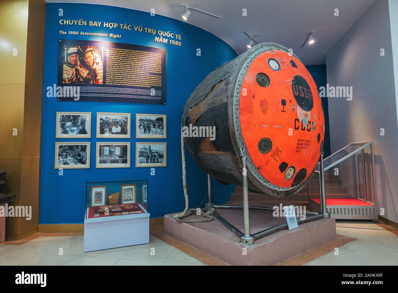 A bright orange Interkosmos Soyuz module on display at the Hanoi Air ...