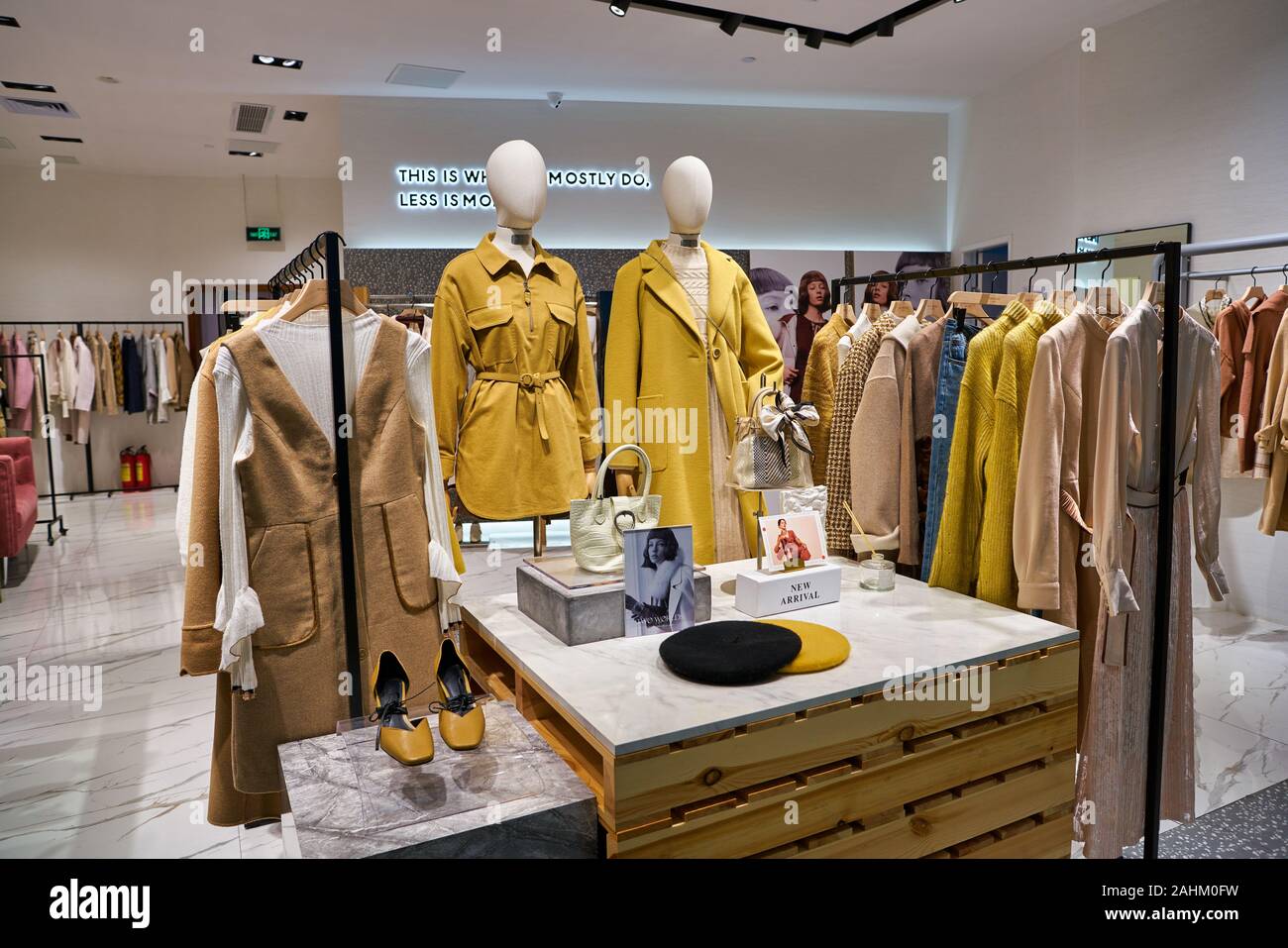 SHENZHEN, CHINA - CIRCA NOVEMBER, 2019: clothing on display at One More ...