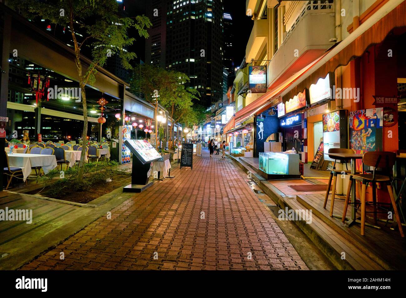 SINGAPORE - CIRCA APRIL, 2019: view of Boat Quay in Singapore at night ...