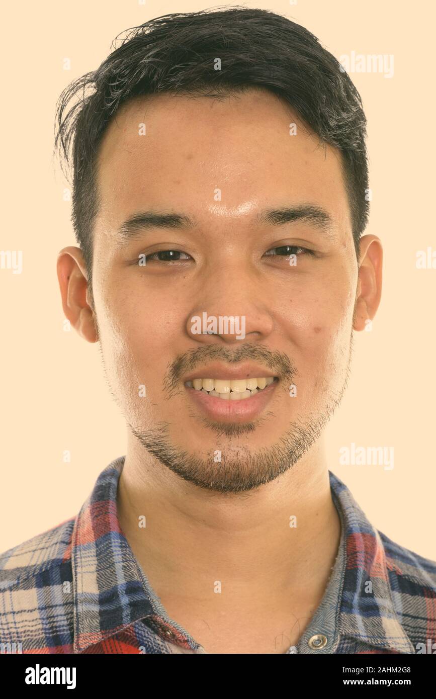 Happy asian face hi-res stock photography and images - Alamy