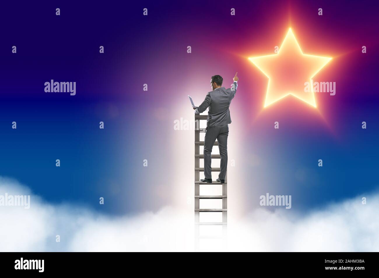 The businessman reaching out for stars Stock Photo - Alamy