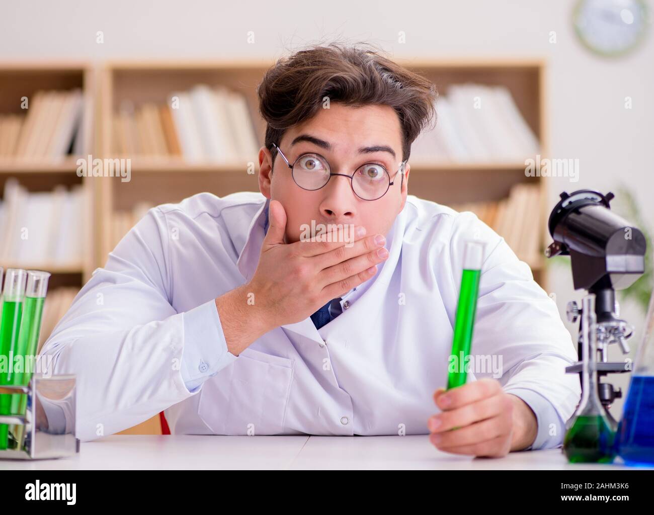 The mad crazy scientist doctor doing experiments in a laboratory Stock ...