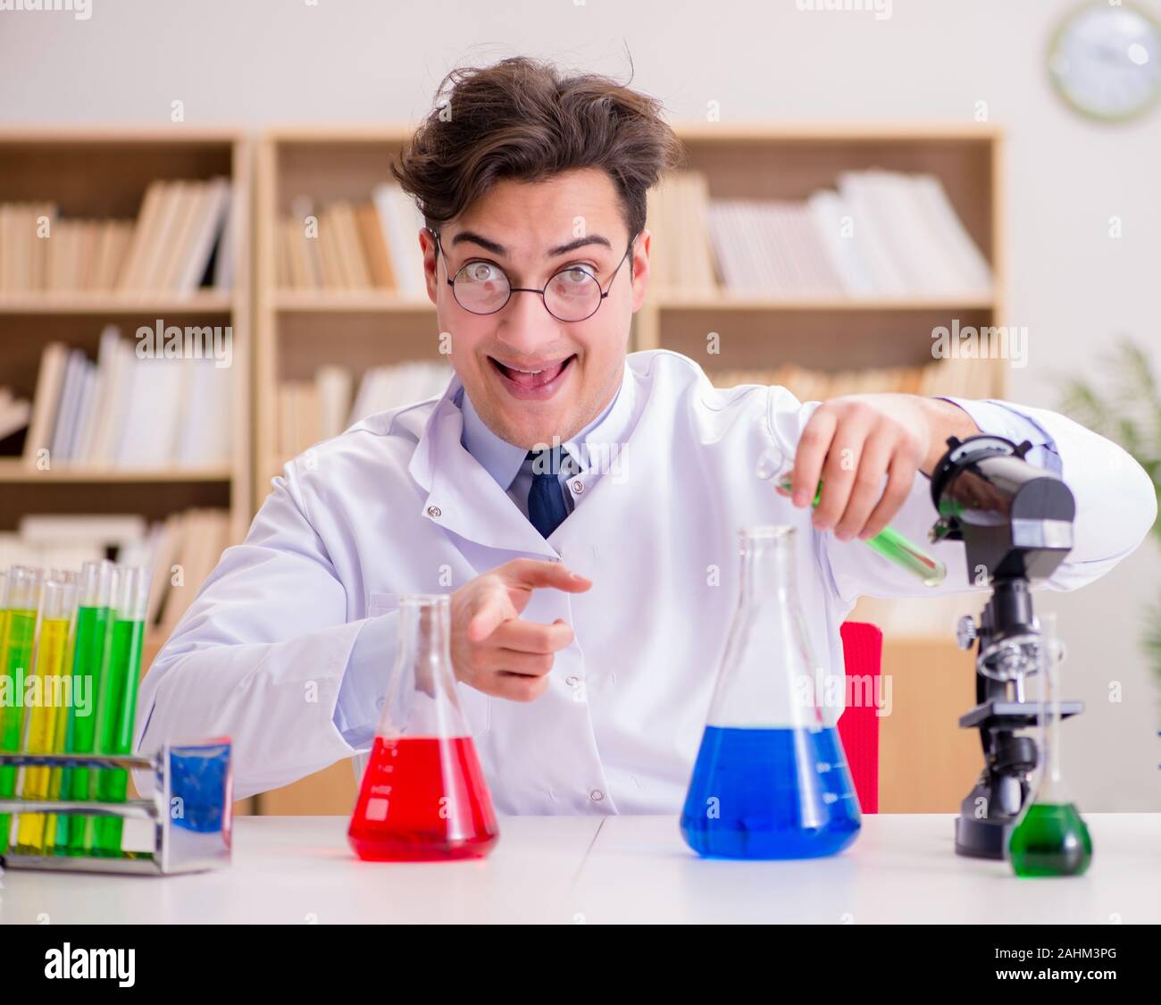 Experiment showing reaction in beaker hi-res stock photography and ...