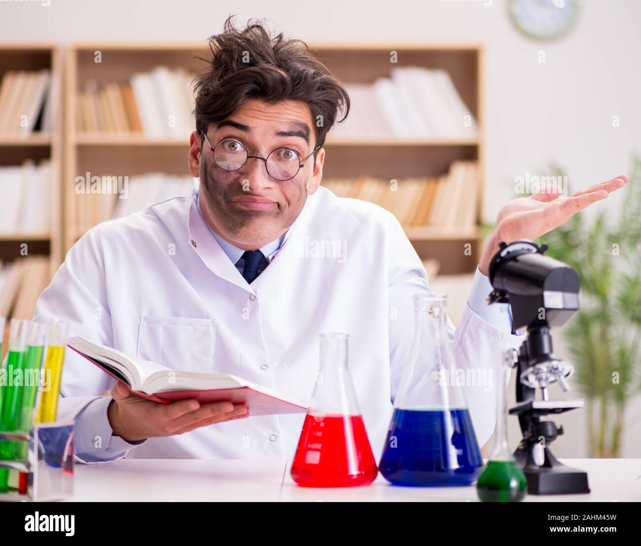 The mad crazy scientist doctor doing experiments in a laboratory Stock ...