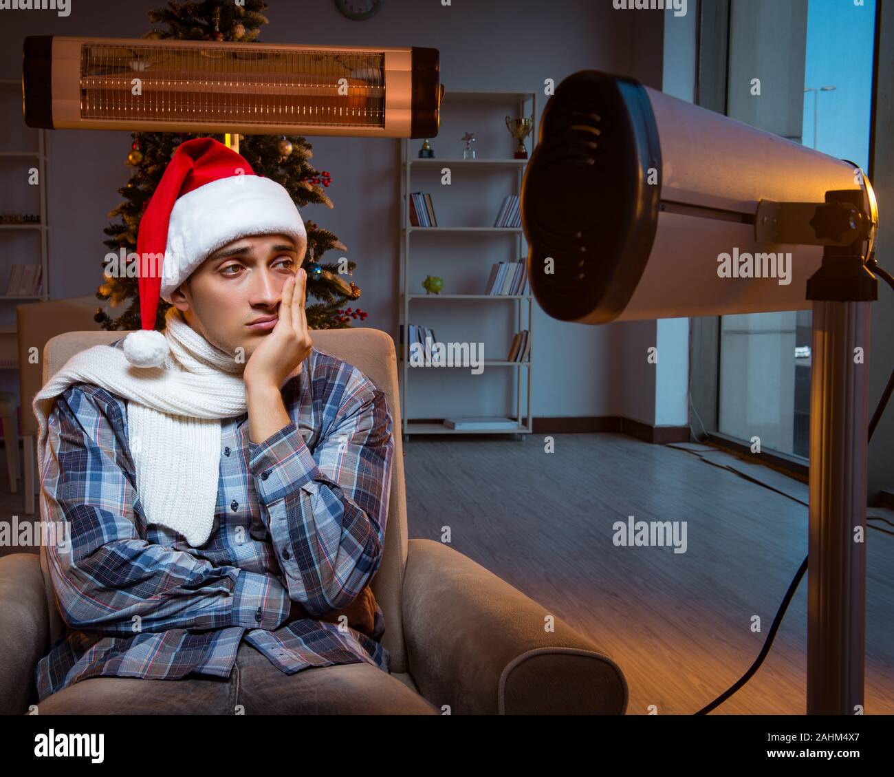 The man suffering from cold at home Stock Photo - Alamy
