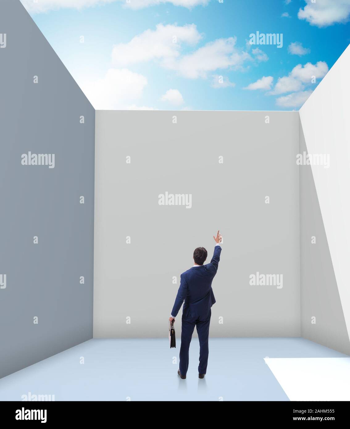 The businessman trying to escape from difficult situation Stock Photo ...