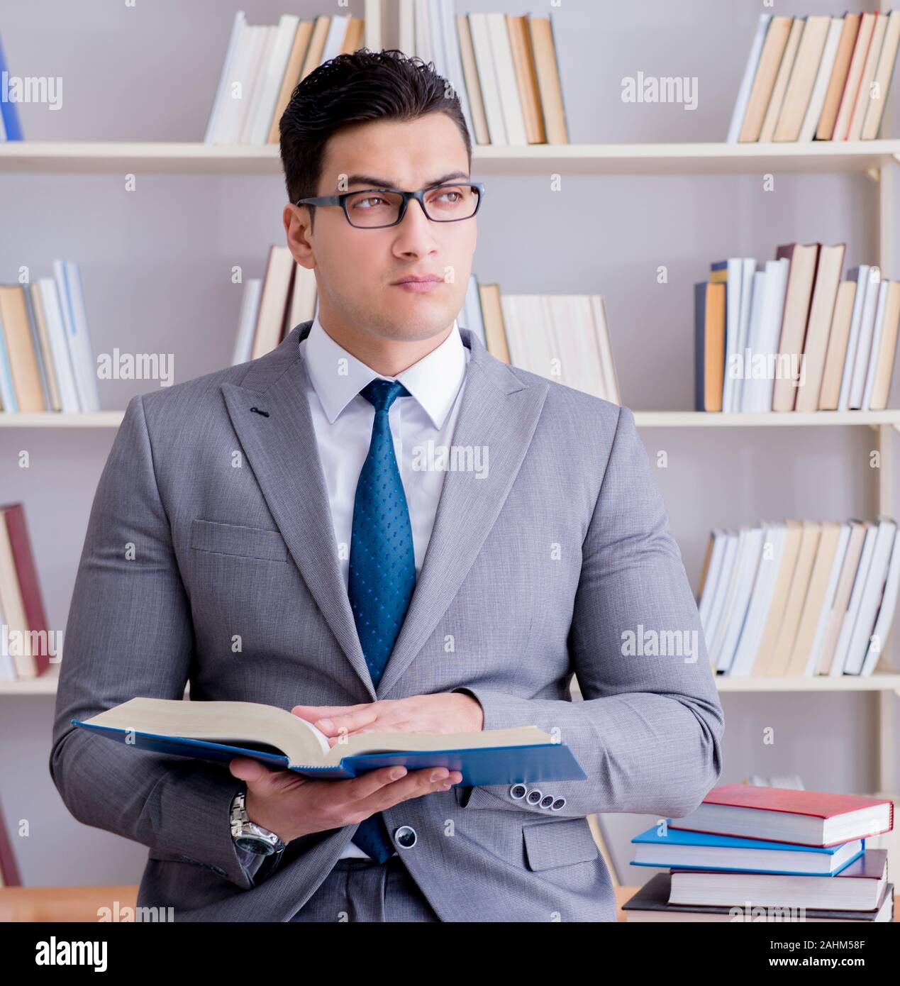 The business law student working studying in the library Stock Photo ...