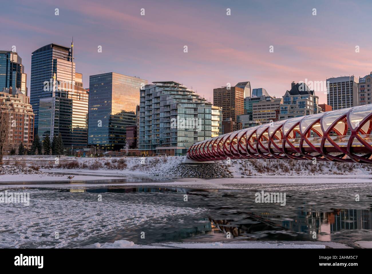 View of Calgary's skyline on a cold winter day. Bow River and the Peace ...