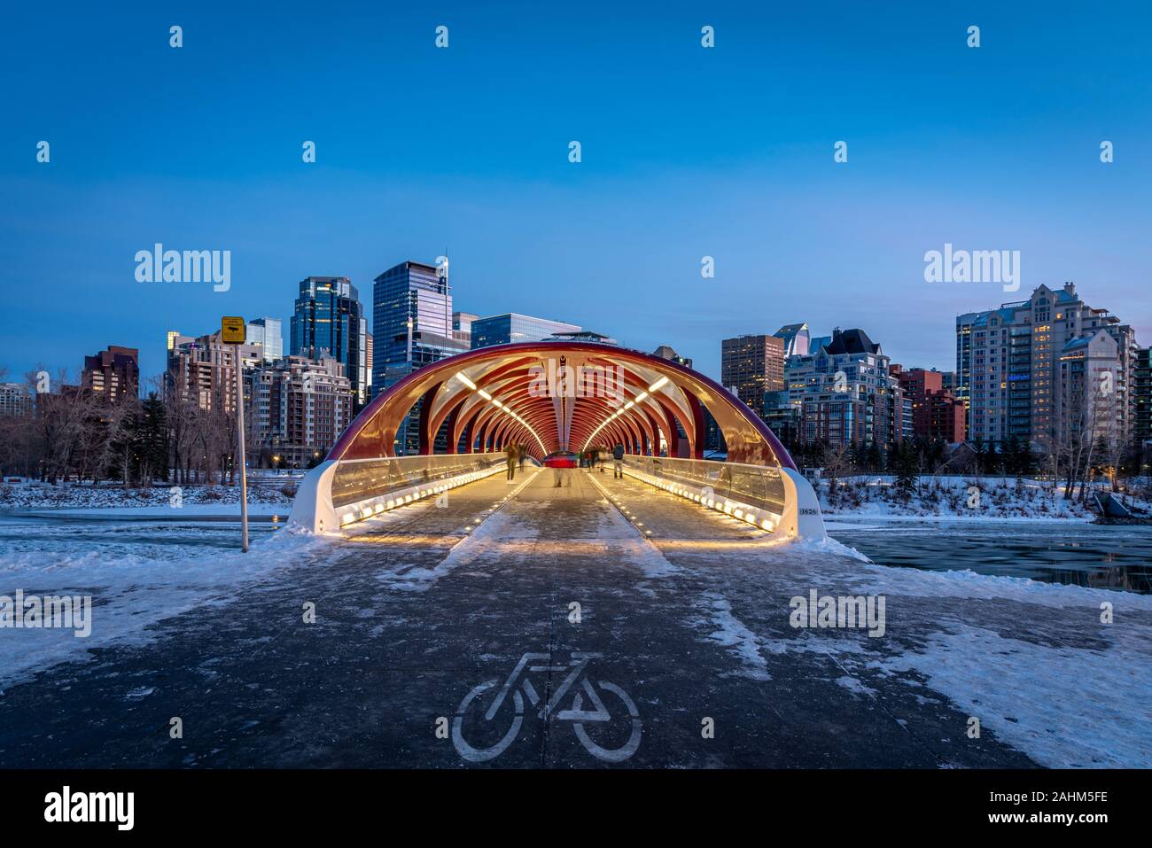 View of Calgary's skyline on a cold winter day. Bow River and the Peace ...