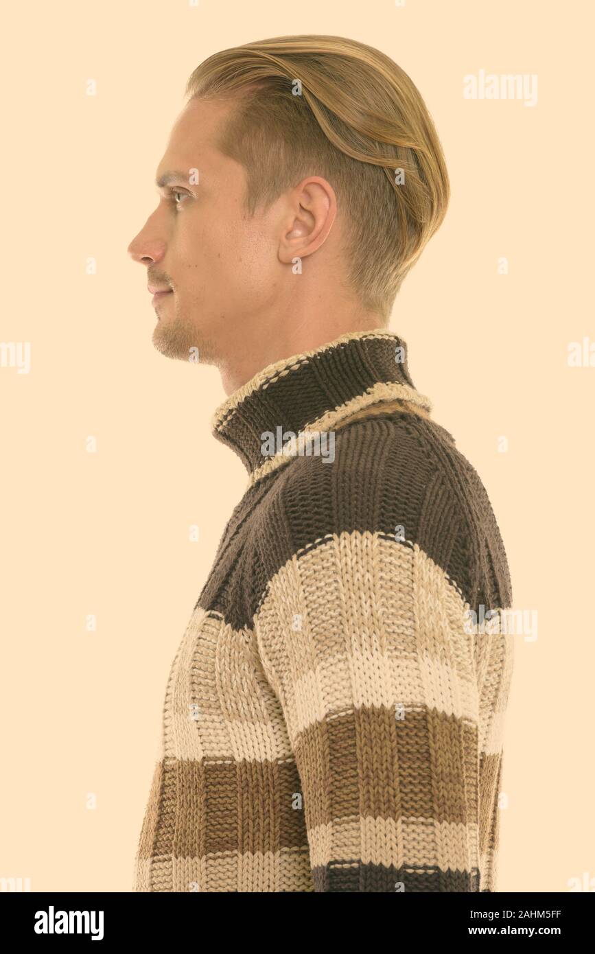 Profile view of young handsome man Stock Photo - Alamy