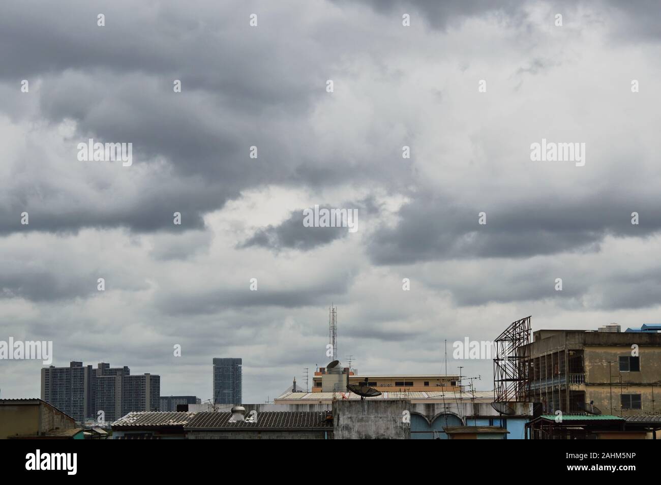rain cloud covering building in the city Stock Photo - Alamy