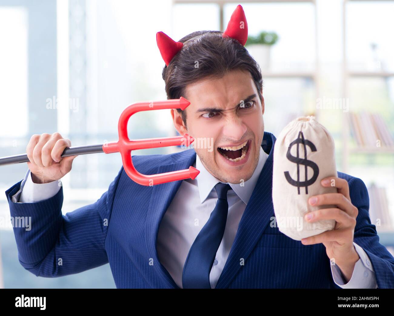 The devil angry businessman in the office Stock Photo - Alamy