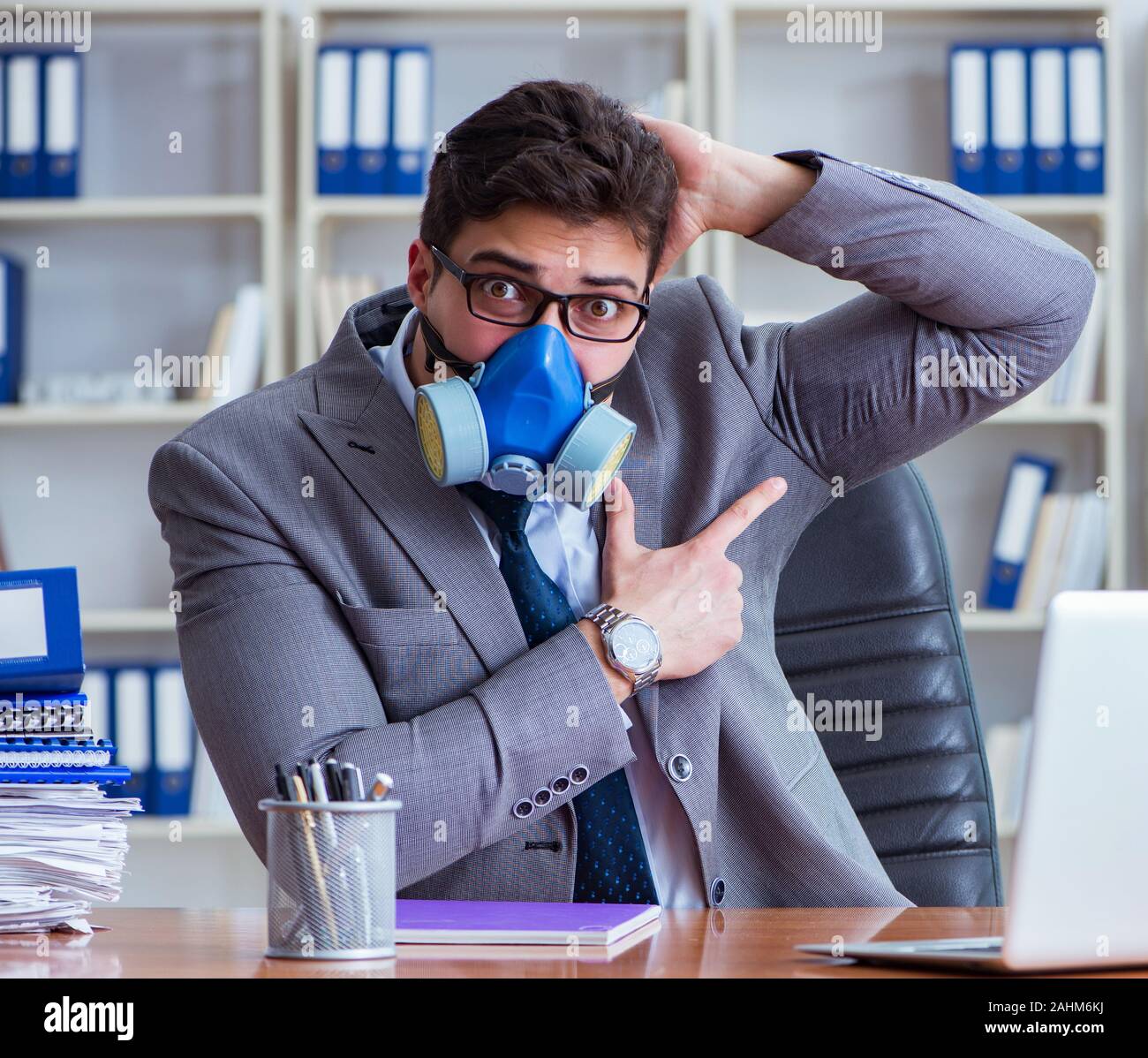 Businessman sweating excessively smelling bad in office at workplace ...