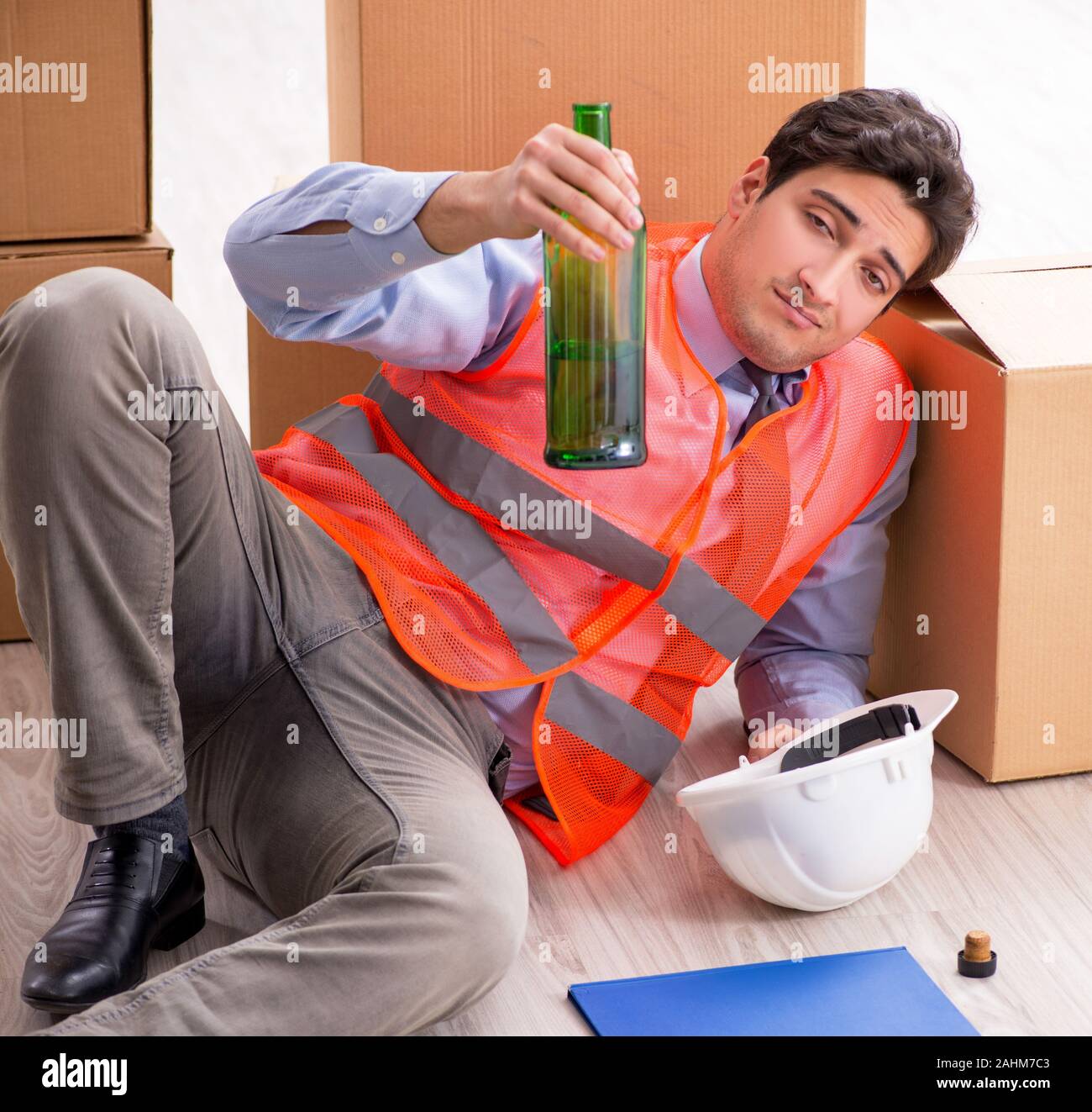 The delivery man drunk at work Stock Photo - Alamy