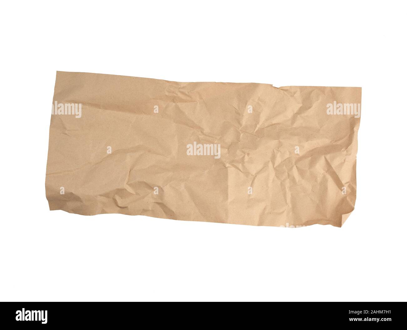 crumpled brown sheet of paper for packaging goods isolated on white ...