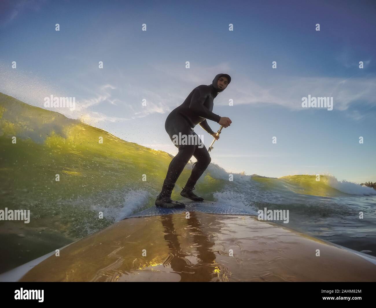 Man Suring Waves Stock Photo - Alamy
