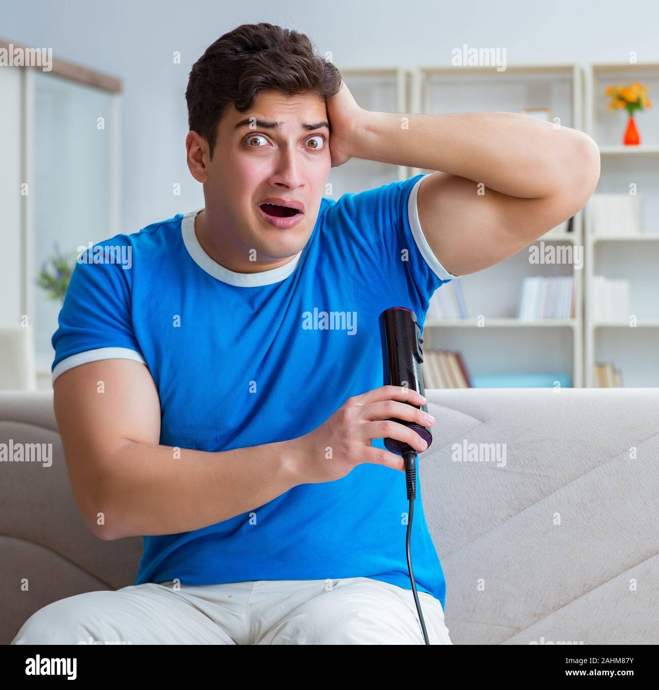 Man sweating and drying hi-res stock photography and images - Alamy