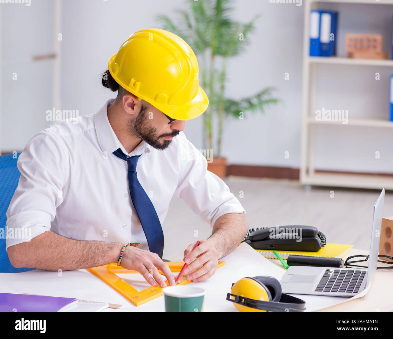 The architect working in his studio on new project Stock Photo - Alamy