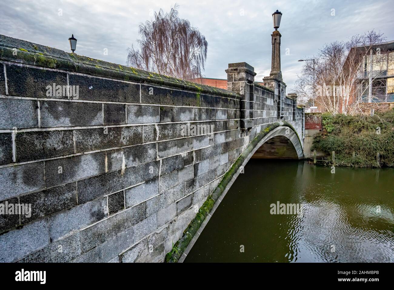 Close up of an ancient stone bridge over the river Stock Photo - Alamy