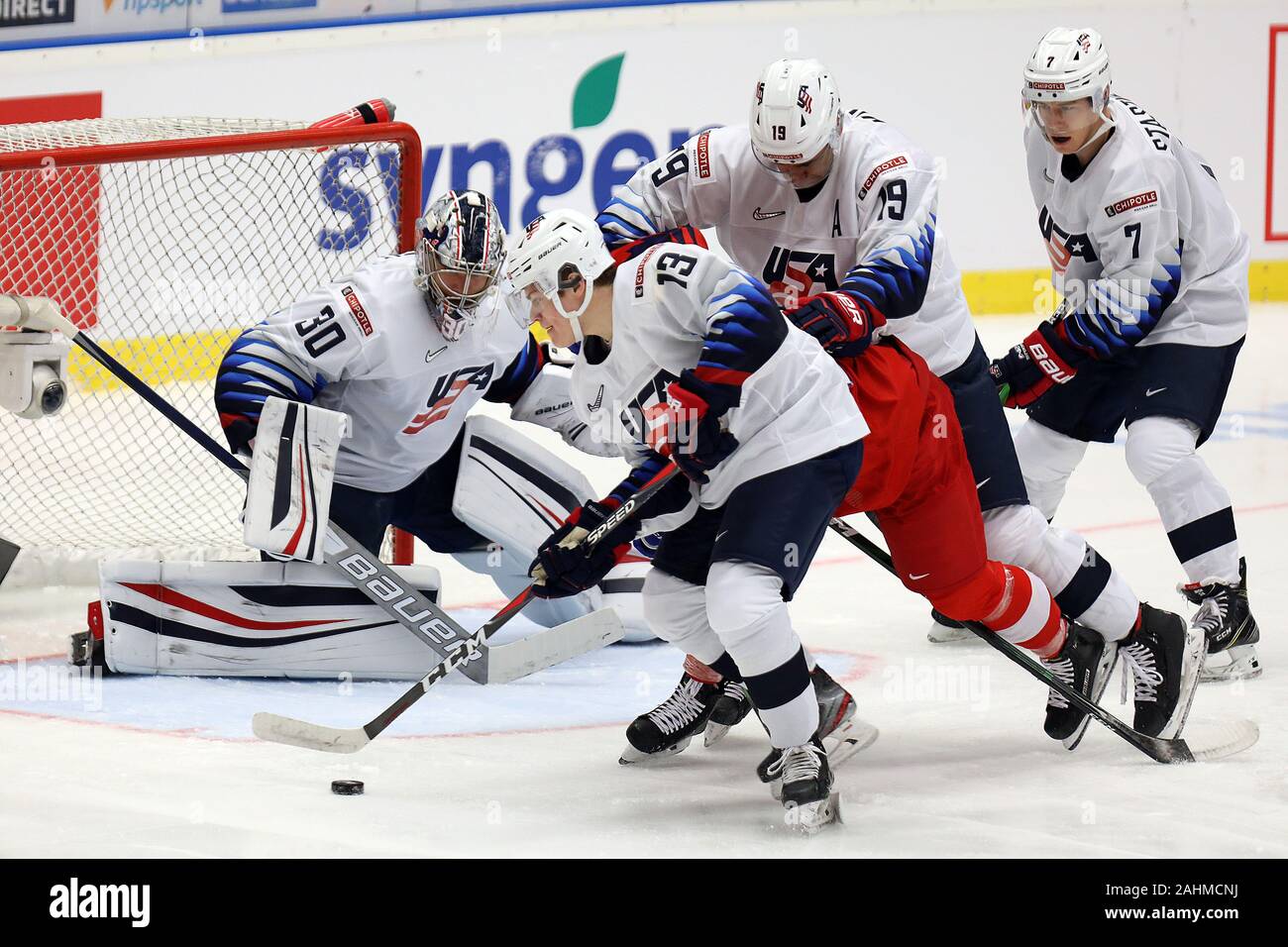 L-R Spencer Knight, Cole Caufield, K'Andre Miller, Spencer Stastney ...
