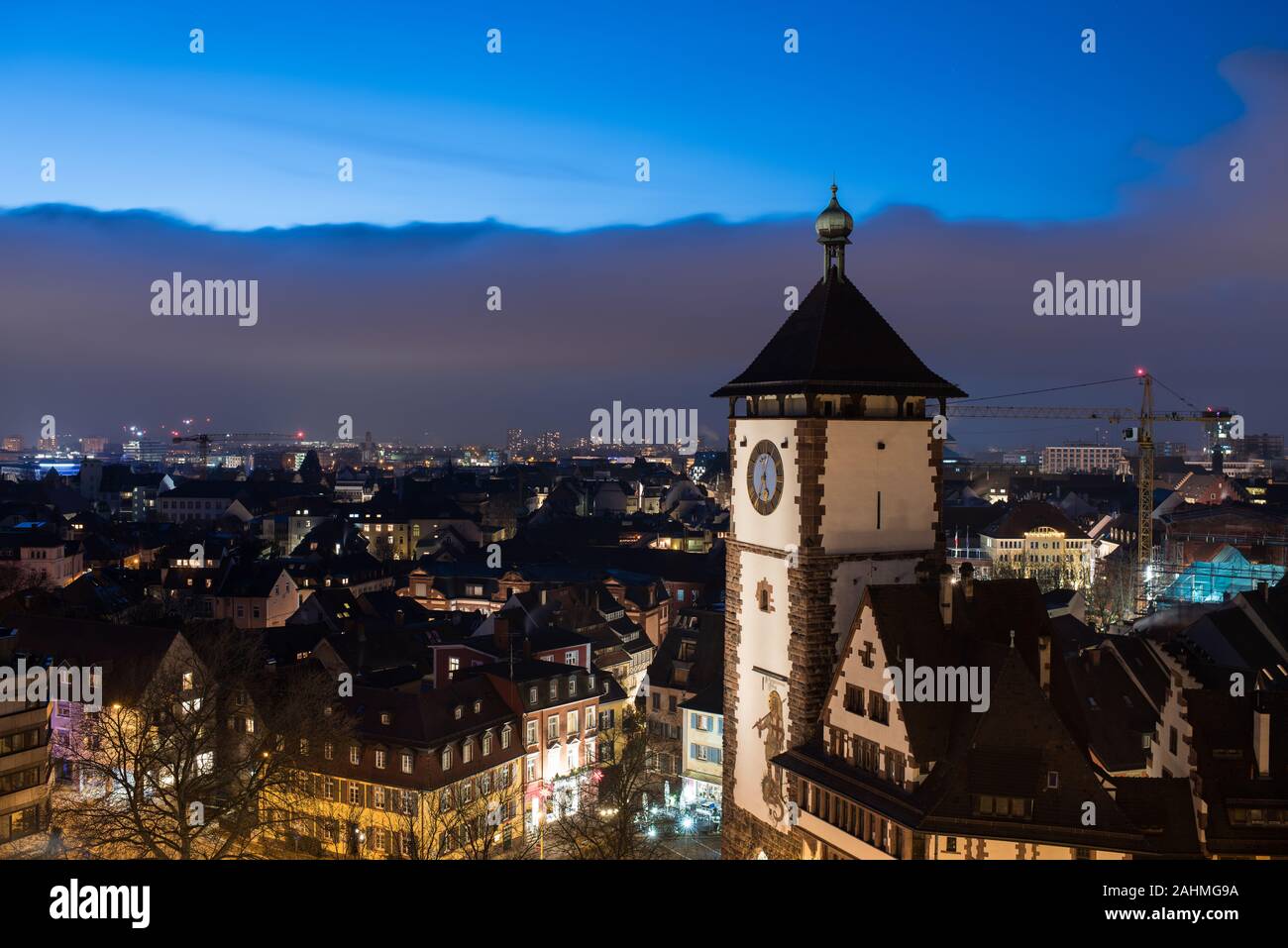 cityscape at night, Freiburg im Breisgau is a university city in ...